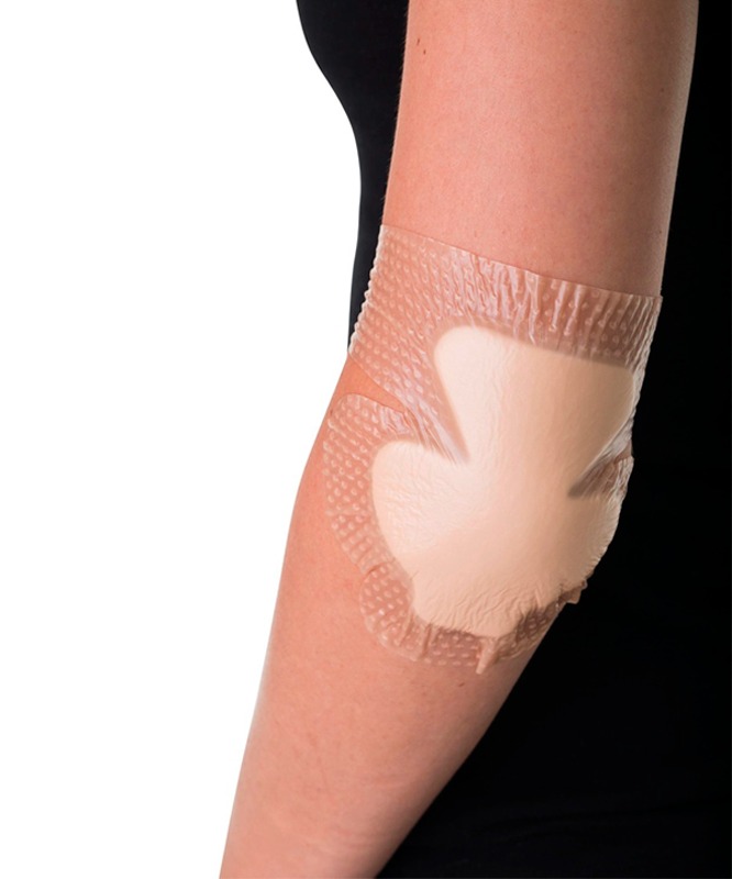 Silicone foam dressing elbow type with border